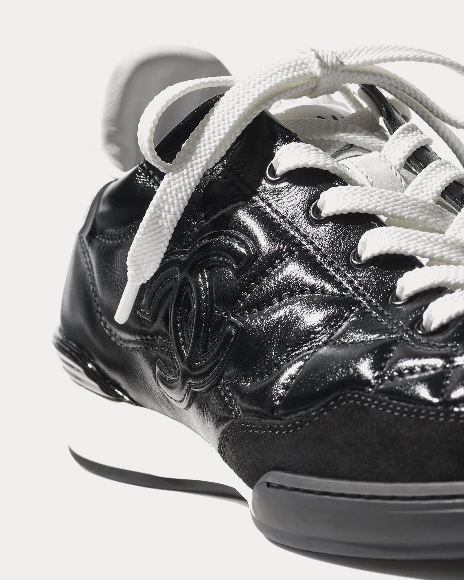 Chanel Women's Shiny Calfskin Black / White Low Top Sneakers & Trainers