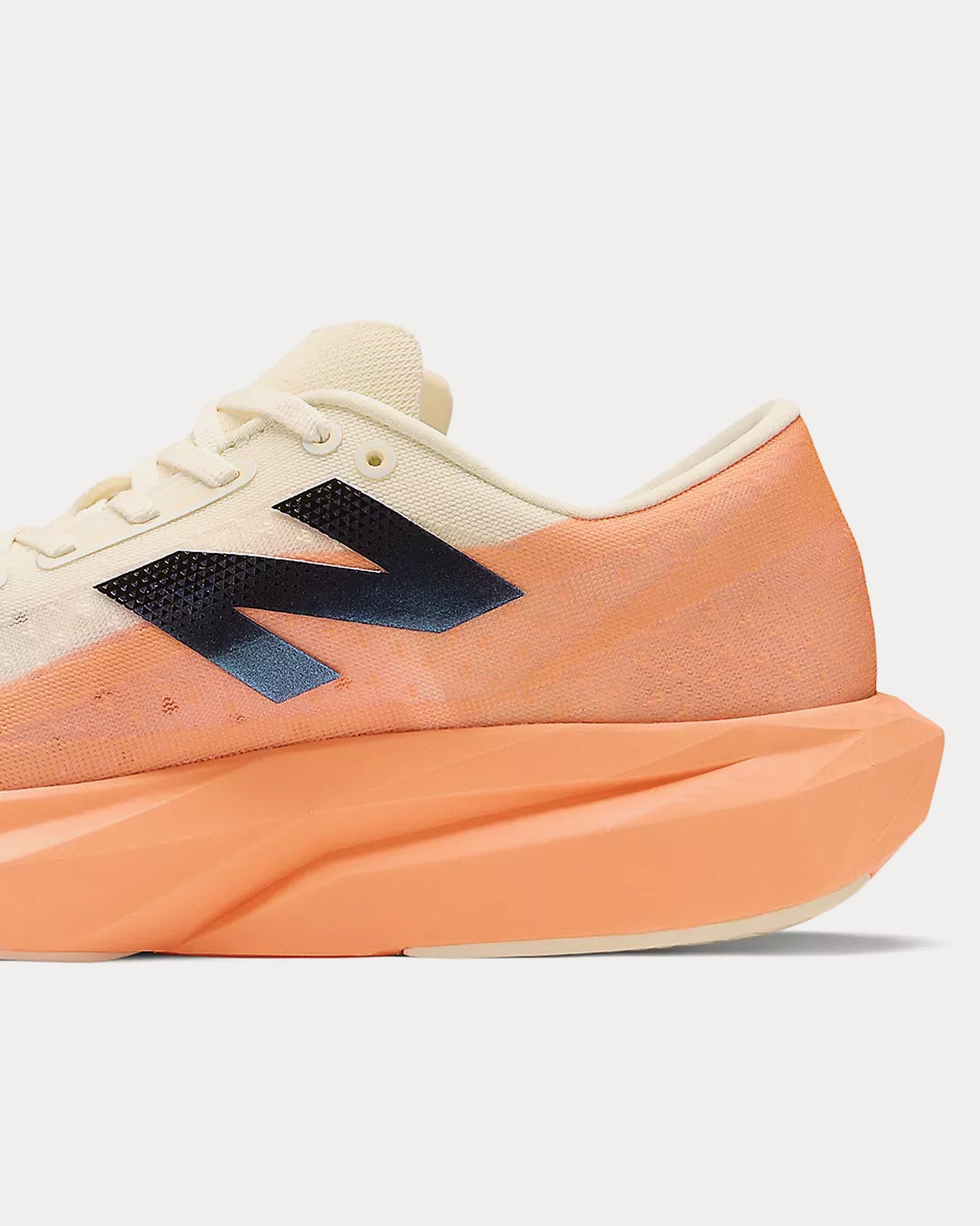 New Balance Women's FuelCell Rebel v4 Hot Mango / Angora / Black ...