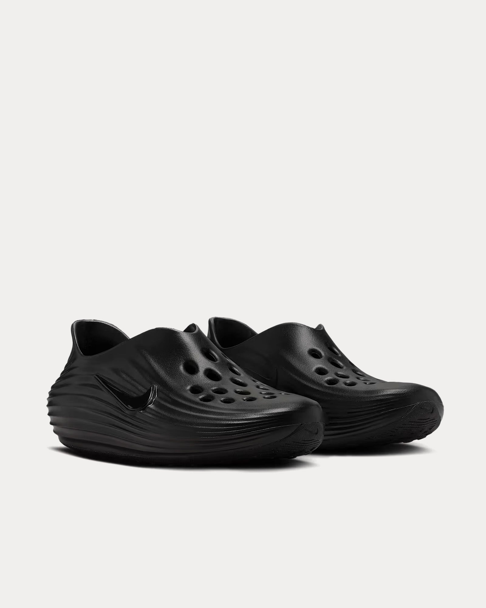 Nike Women's ReactX Rejuven8 Black / Black / Black Slip Ons