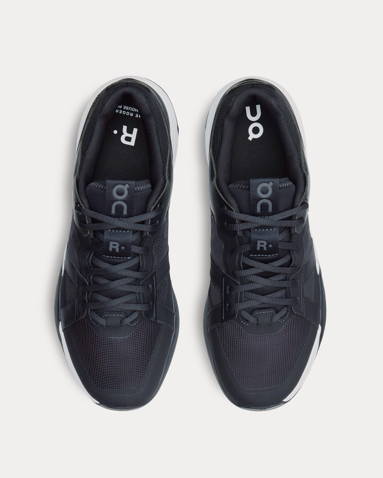On Running Men's The Roger Clubhouse Pro Black / White Low Top Sneakers